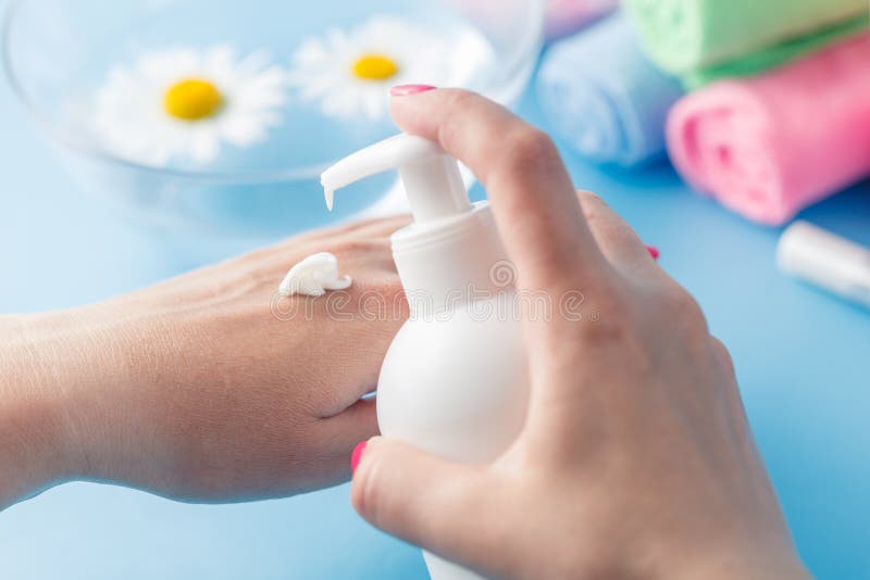 Woman Applying Cream on Hands Stock Photo - Image of moisturize ...
