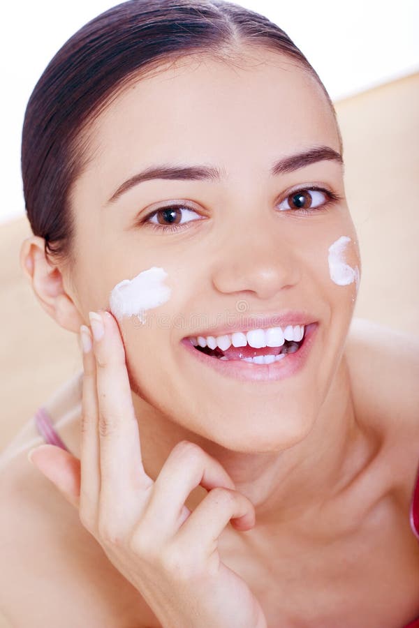 Woman Applying Cream On Her Face Stock Image Image Of Lifestyle Body