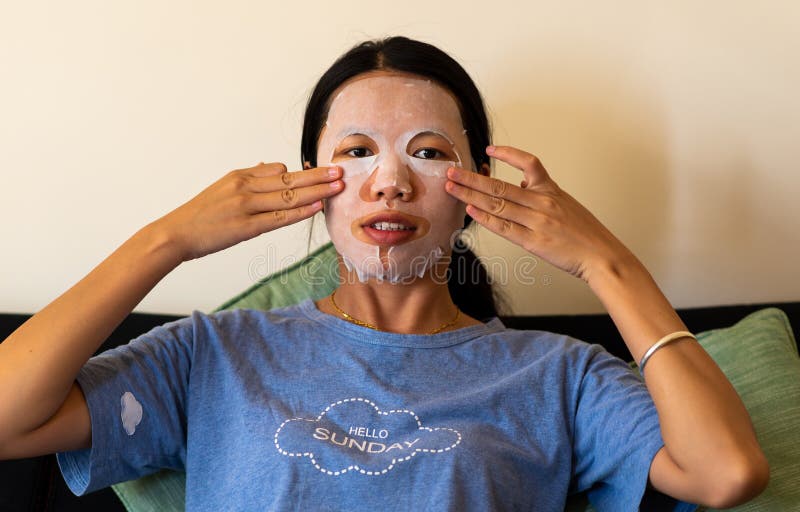Woman Applying Face Mask at Home Stock Photo - Image of chinese, calm ... Woman Applying Face Mask at Home Stock Photo - Image of chinese, calm ...
