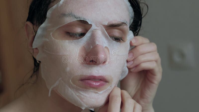 Woman Applying Facial Mask On Face At Home Stock Footage Video Of