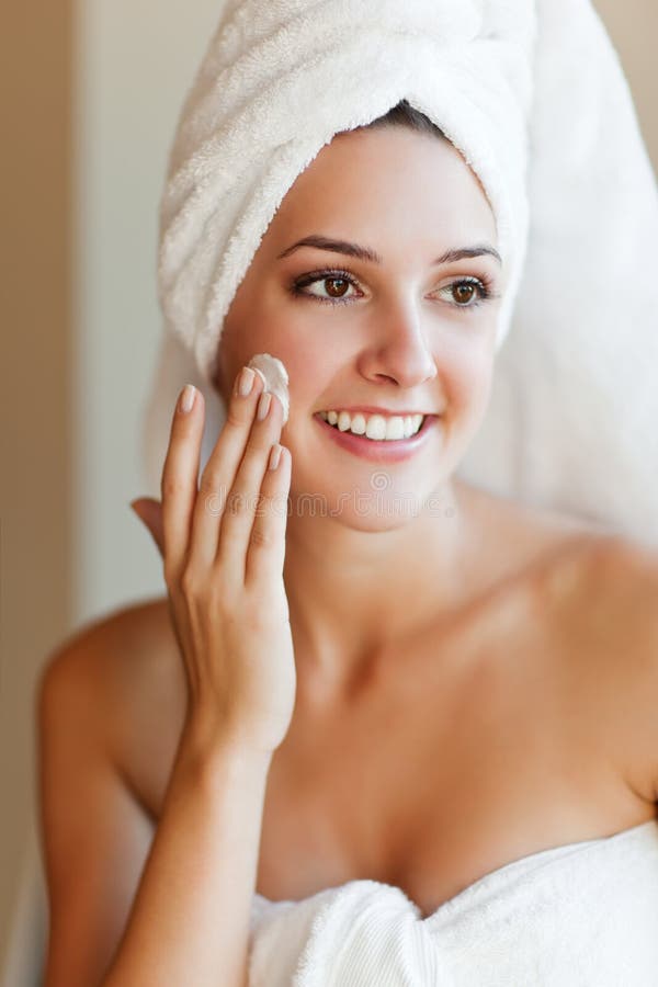 Woman applying lotion stock image. Image of natural, knuckle - 17000953