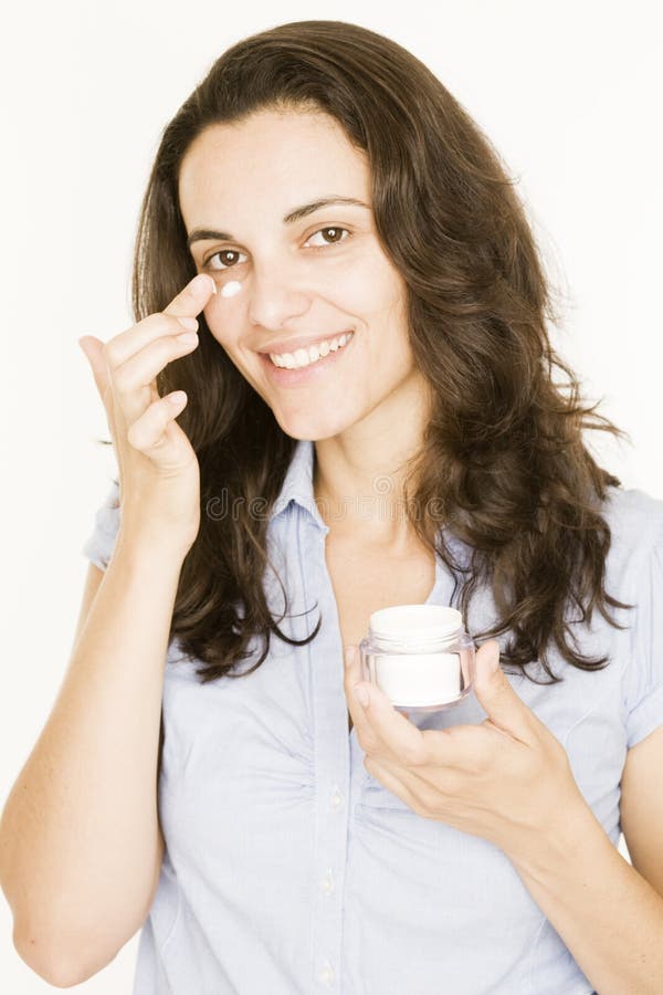 Woman Applying Lotion on Her Face Stock Photo - Image of adult, care ...