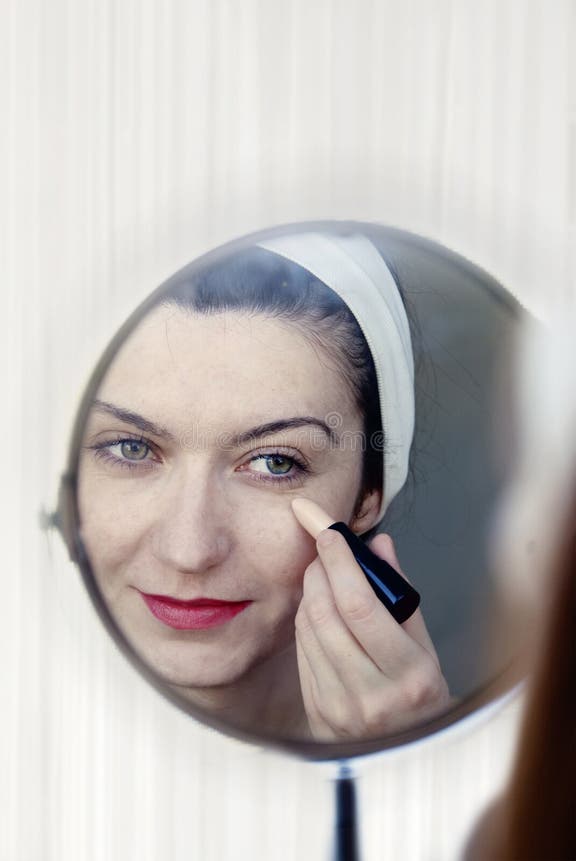Woman applying make up stock image. Image of close, cosmetics - 23444109