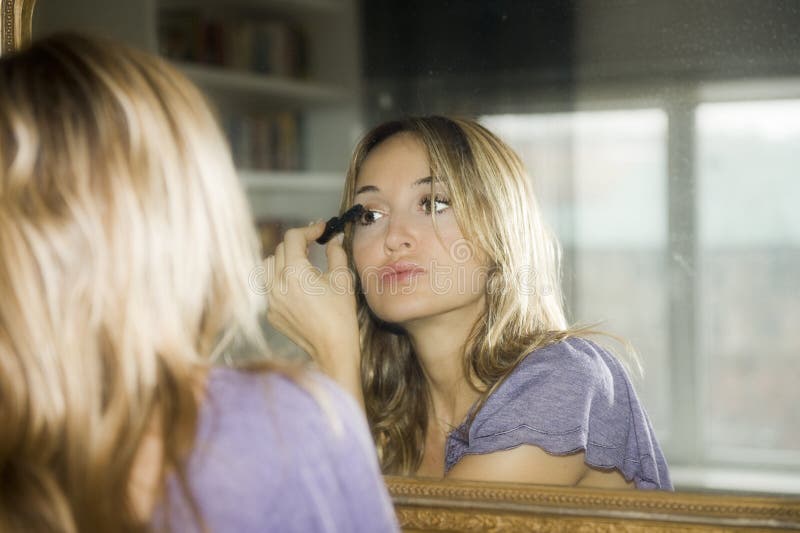 Woman Applying Makeup Picture. Image: 8083596