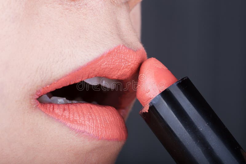 Man Applying Orange Paint with Roller Brush on White Wall, Closeup ...