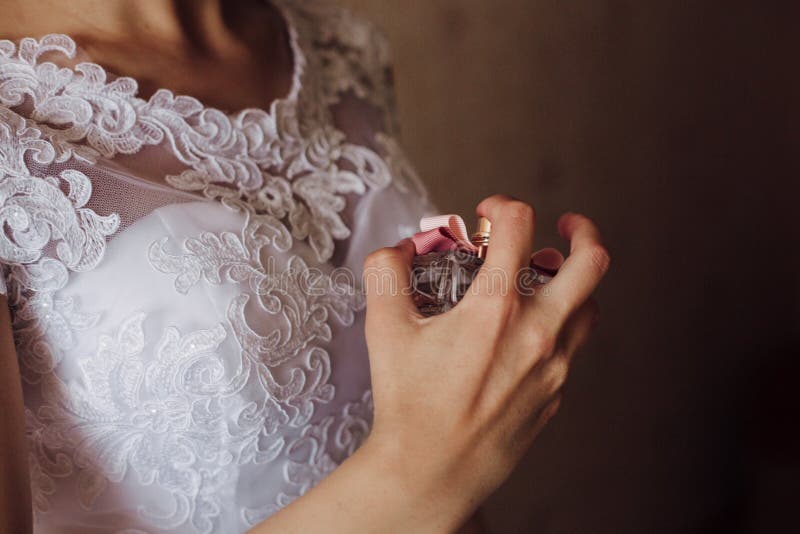 Woman Applying Perfume on Her Wrist Stock Photo - Image of bride, adult ...