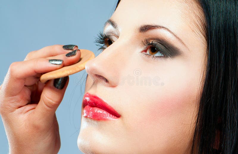 Woman applying powder stock image. Image of healthcare - 25975551