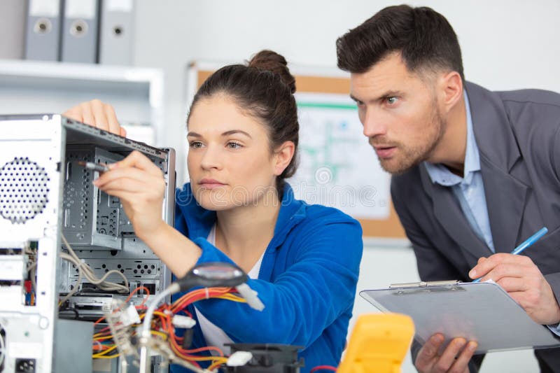 Woman Apprentice Computer Repairer Monitored by Teacher Stock Photo ...