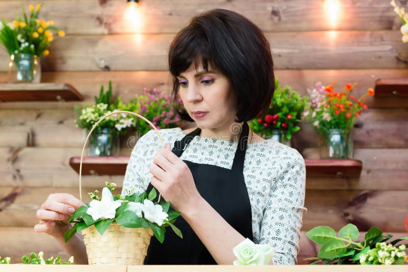 Woman in Apron at Her Workplace in Flower Shop Stock Image - Image of ...