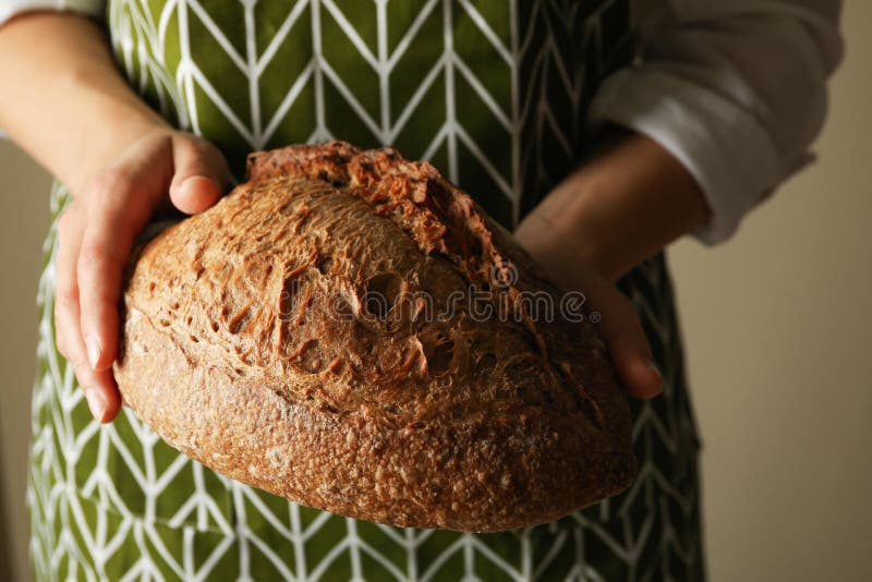 Woman in Apron Hold Fresh Baked Bread Stock Image - Image of person ...