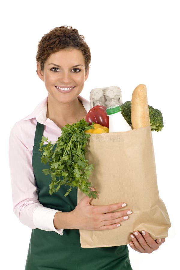 Woman in Apron Holding Grocery Bag Stock Photo - Image of happiness ... Woman in Apron Holding Grocery Bag Stock Photo - Image of happiness ...