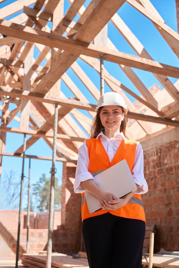 Woman Carpenter Preparing Girders and Delivering Its on Roof Stock ...