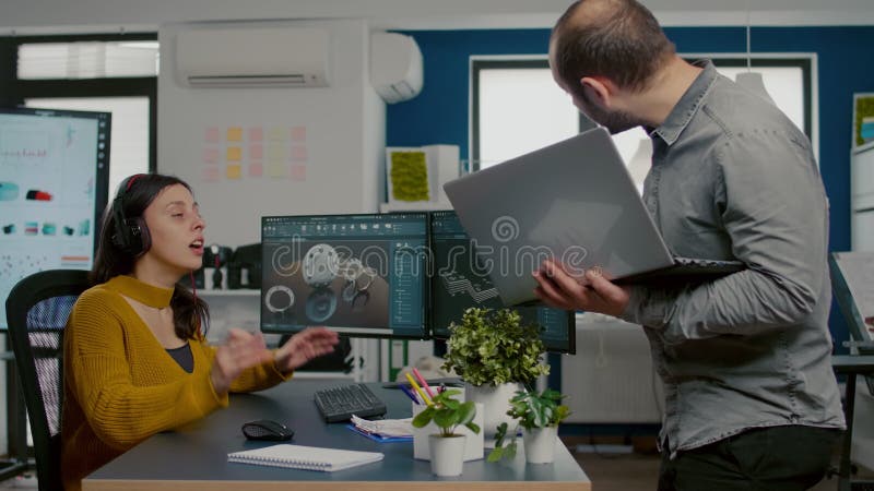 Woman Architect Engineer Taking Off Headset Talking with Project ...