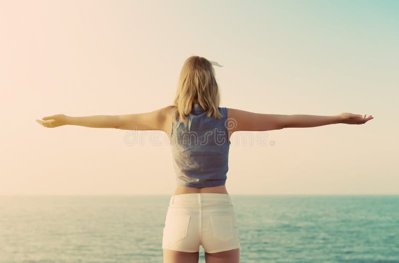 Woman with arms wide open. stock photo. Image of nature - 60963798