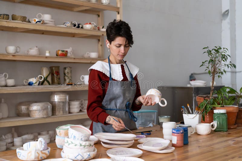 Woman Art Classes Student or Pottery Studio Owner Create Potter Cup for ...