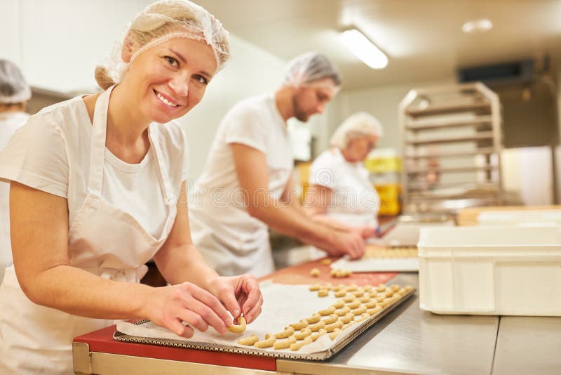 Woman As a Baker`s Apprentice Baking Vanilla Crescents Stock Image ...