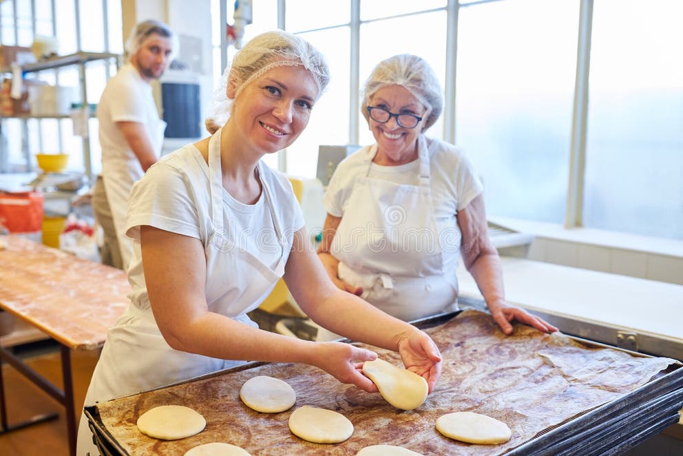 Woman As a Baker`s Apprentice in Training in Baking Stock Photo - Image ...