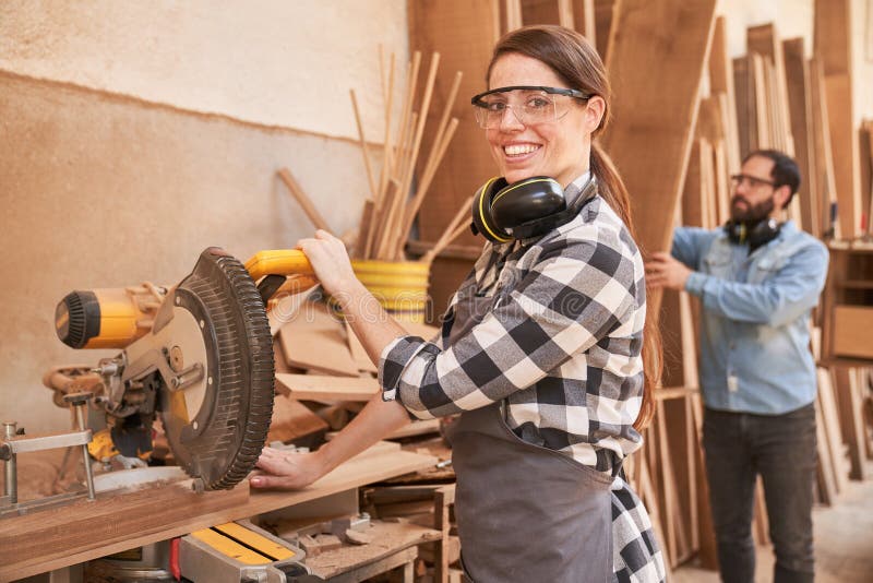 Woman As a Craftsman Apprentice at the Chop Saw Stock Image - Image of ...