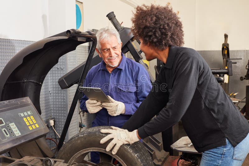 Woman As a Mechatronics Apprentice at the Tire Assembly Stock Photo ...