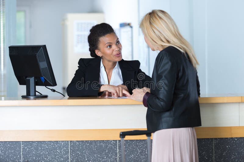 Woman in spa receptionist stock image. Image of relax - 240921787