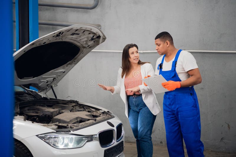 Woman Asks Mechanic To Fix Car Engine Stock Image - Image of ...