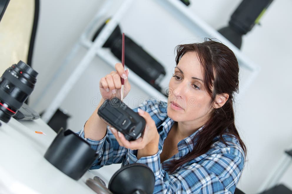 Woman Assembling Camera Parts Stock Image - Image of photographer ...