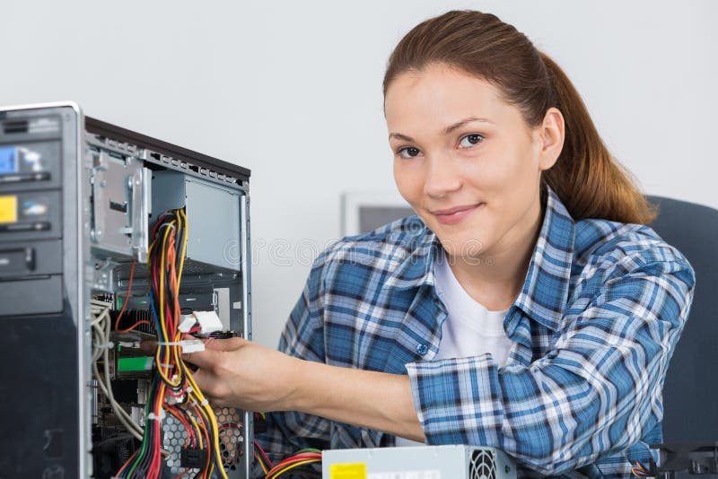 Woman assembling hardware stock photo. Image of engineer - 208759274
