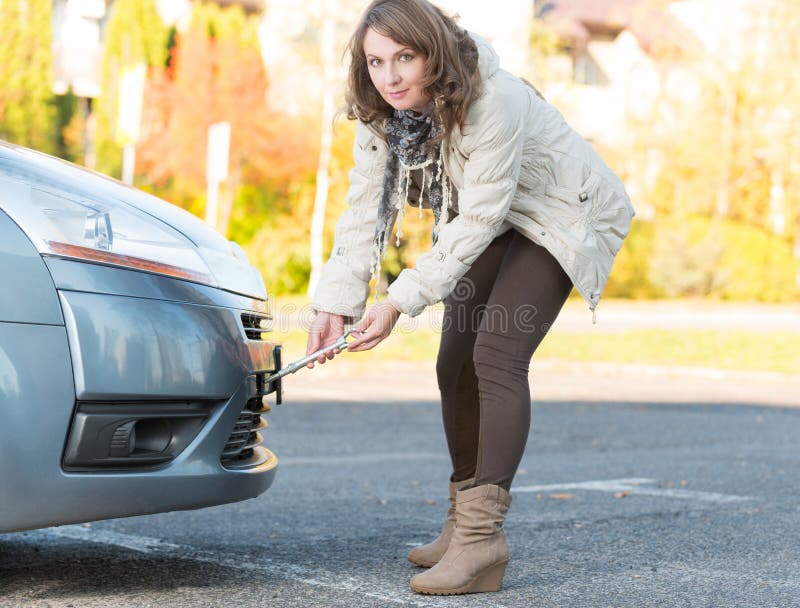 Woman Assembling Towing Hook Stock Image - Image of problem, help: 39557697