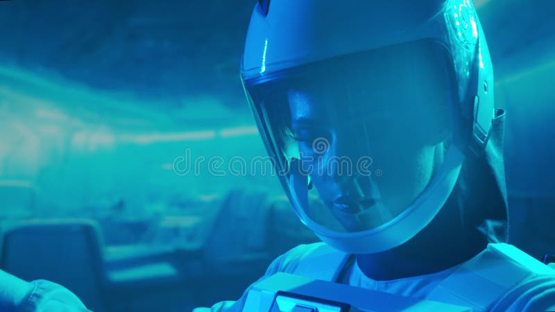 A Woman Astronaut In A Space Suit Aboard The Orbital Station A Young Female Cosmonaut Pilots A