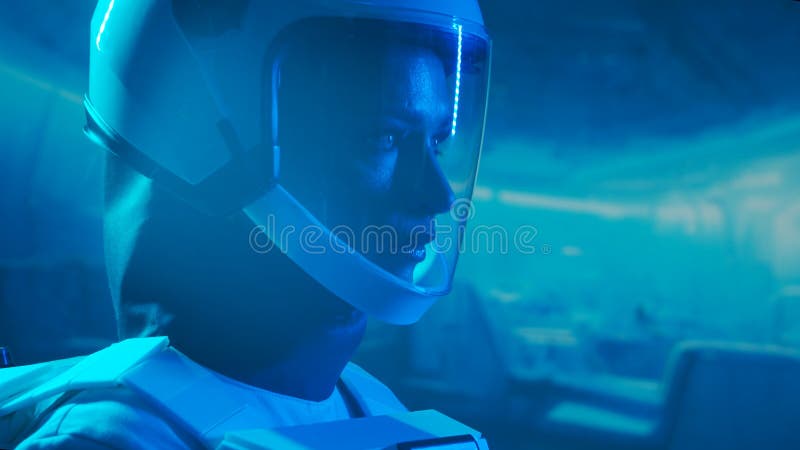 A Woman Astronaut In A Space Suit Aboard The Orbital Station A Young Female Cosmonaut Pilots A