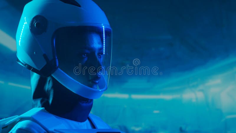 A Woman Astronaut In A Space Suit Aboard The Orbital Station A Young Female Cosmonaut Pilots A