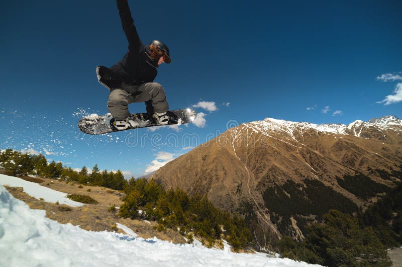 Woman Athlete Snowboarder Flies after Jumping from Kicker Doing Trick ...