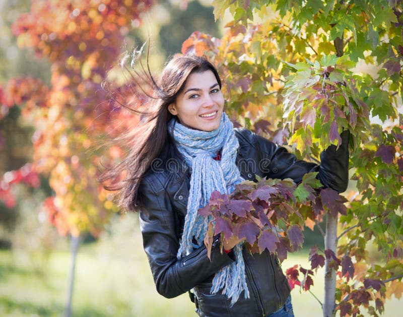 Woman in autumn park stock image. Image of model, season - 79737111