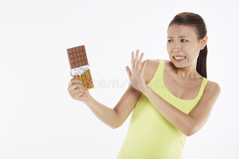 Woman Avoiding from a Bar of Chocolate Stock Image - Image of ...