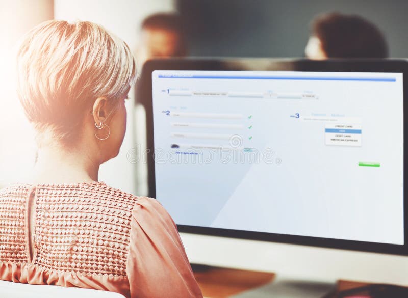 Woman, Back and Reading with Computer in Office for Administrative Work ...