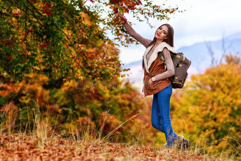 Woman with Backpack Hiking during Autumn Stock Image - Image of ...
