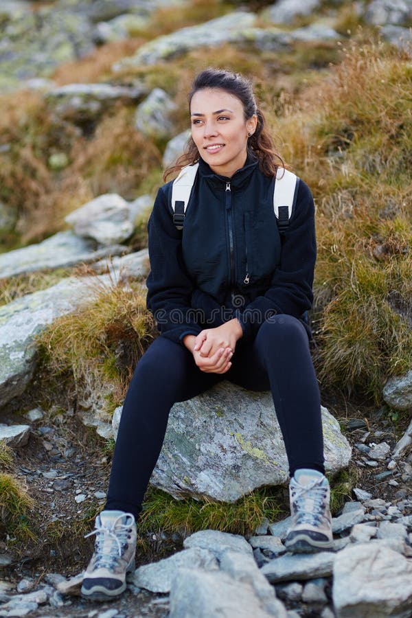 Woman with Backpack Resting Stock Photo - Image of hiker, athletic ...