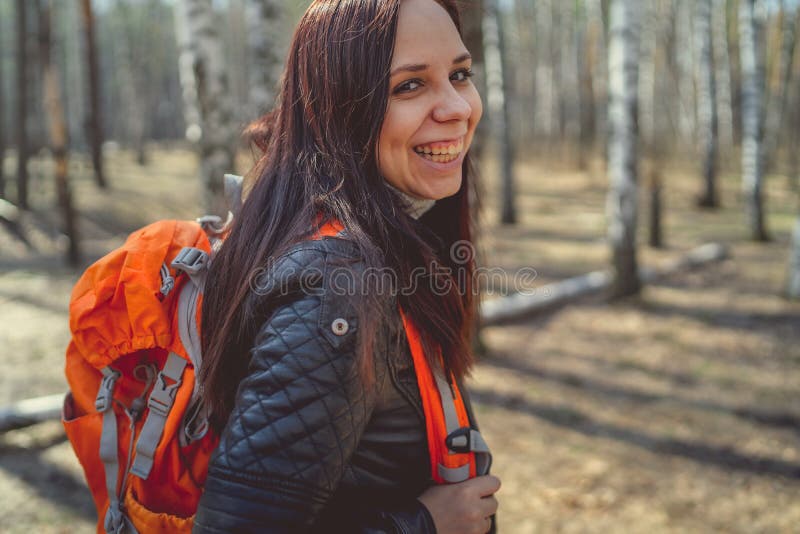 Woman with Backpack Walking in Woods Side View of Casual Woman Carrying ...