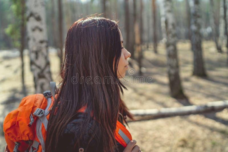 Woman with Backpack Walking in Woods Side View of Casual Woman Carrying ...