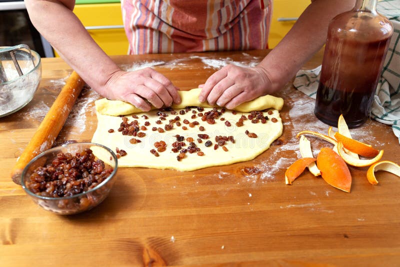 Woman Baker Rolls Raisins into Pastry for Making Buns Stock Image ...