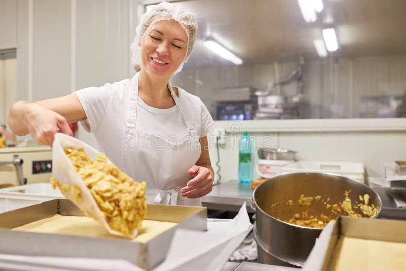 Woman in the Baker`s Apprenticeship Baking Apple Pie Stock Photo ...