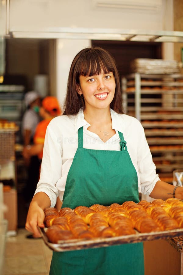 Female baker in bakery stock image. Image of bakery, pose - 19380991