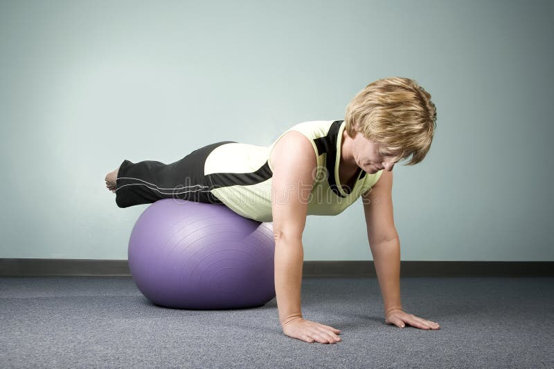 Woman Balancing on an Exercise Ball Stock Photo - Image of woman, body ...