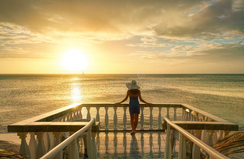 Woman Looking At Sunset Picture. Image: 109889708