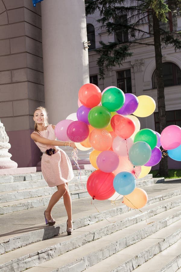 Woman with balloons stock image. Image of balloon, model - 26897409