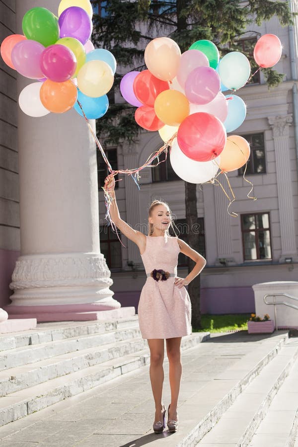 Woman with balloons stock photo. Image of latex, balloon - 26897778