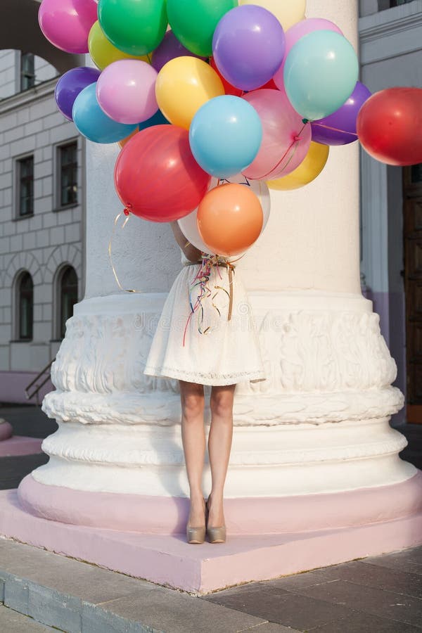 Woman with balloons stock image. Image of blonde, fashion - 26918383