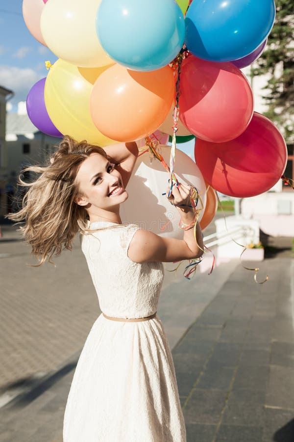 Woman with balloons stock image. Image of person, lifestyle - 26935957