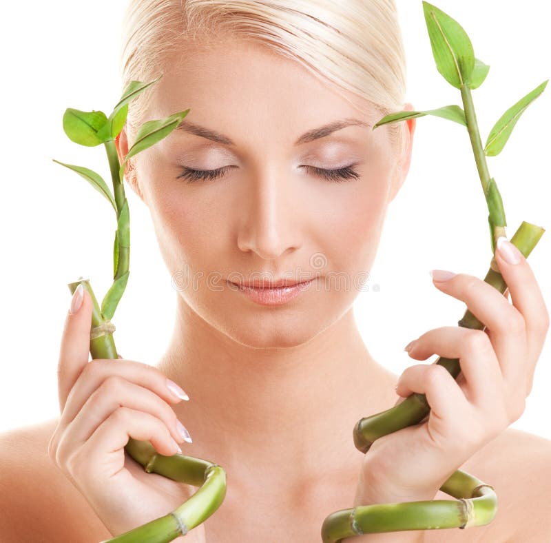 Woman with a bamboo plant stock photo. Image of growing - 5284314