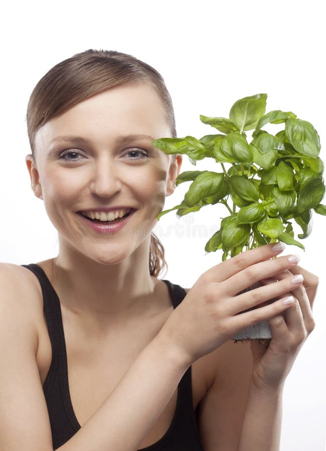 Woman with basil stock photo. Image of enjoying, human - 15073996